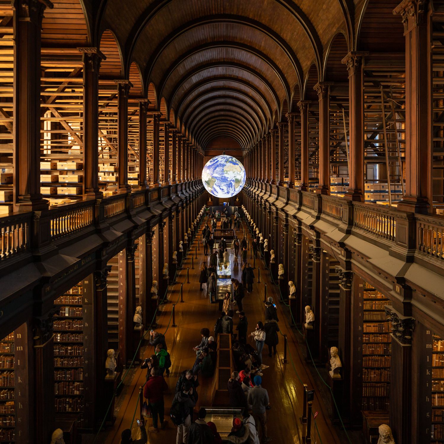 Why have books been removed from Trinity College Library?